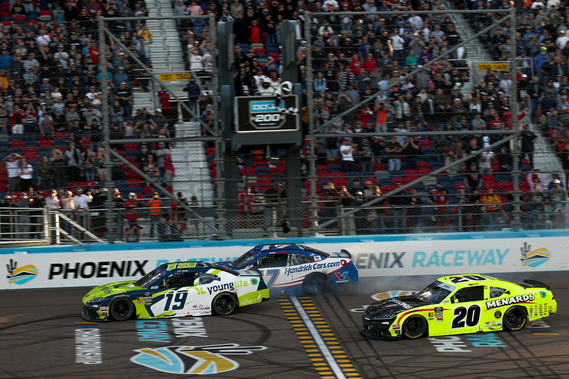 Aric Almirola edges Alex Bowman for thrilling overtime Xfinity victory ...